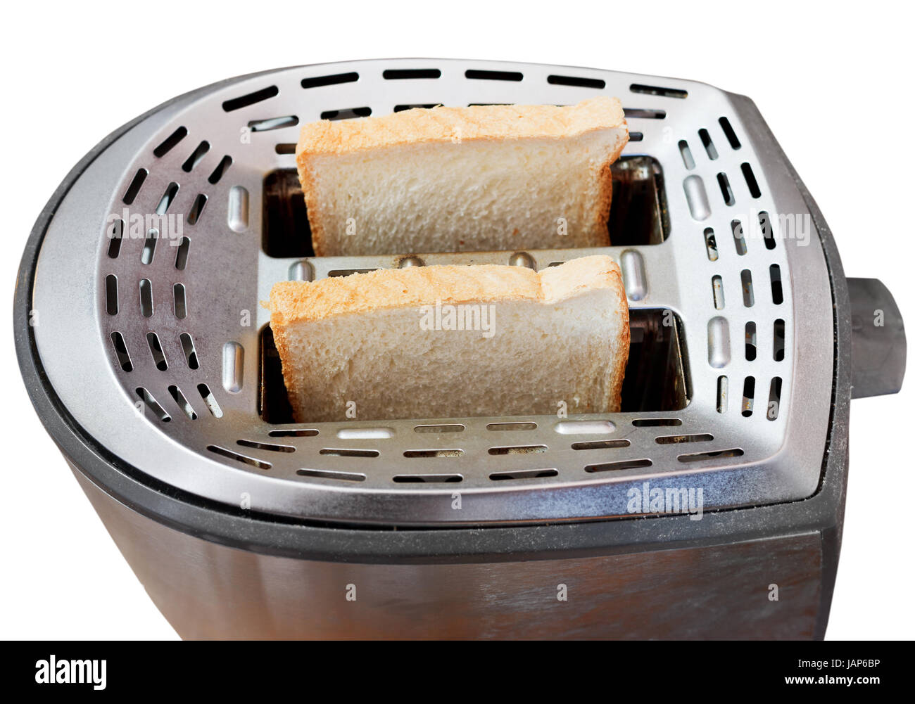 two fresh slices of bread in metal toaster isolated on white background ...