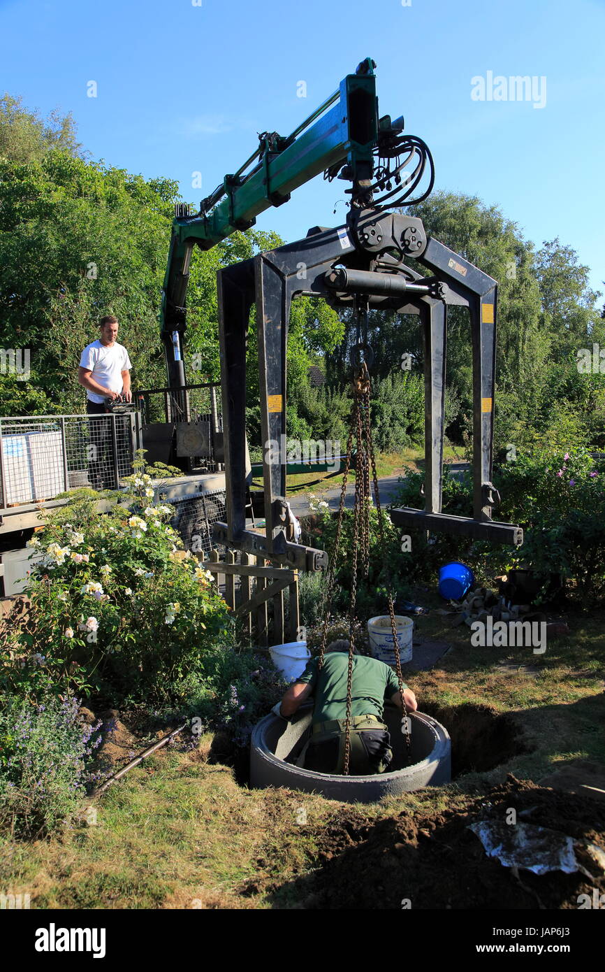 Delivery and installation of concrete ring for domestic septic tank ...