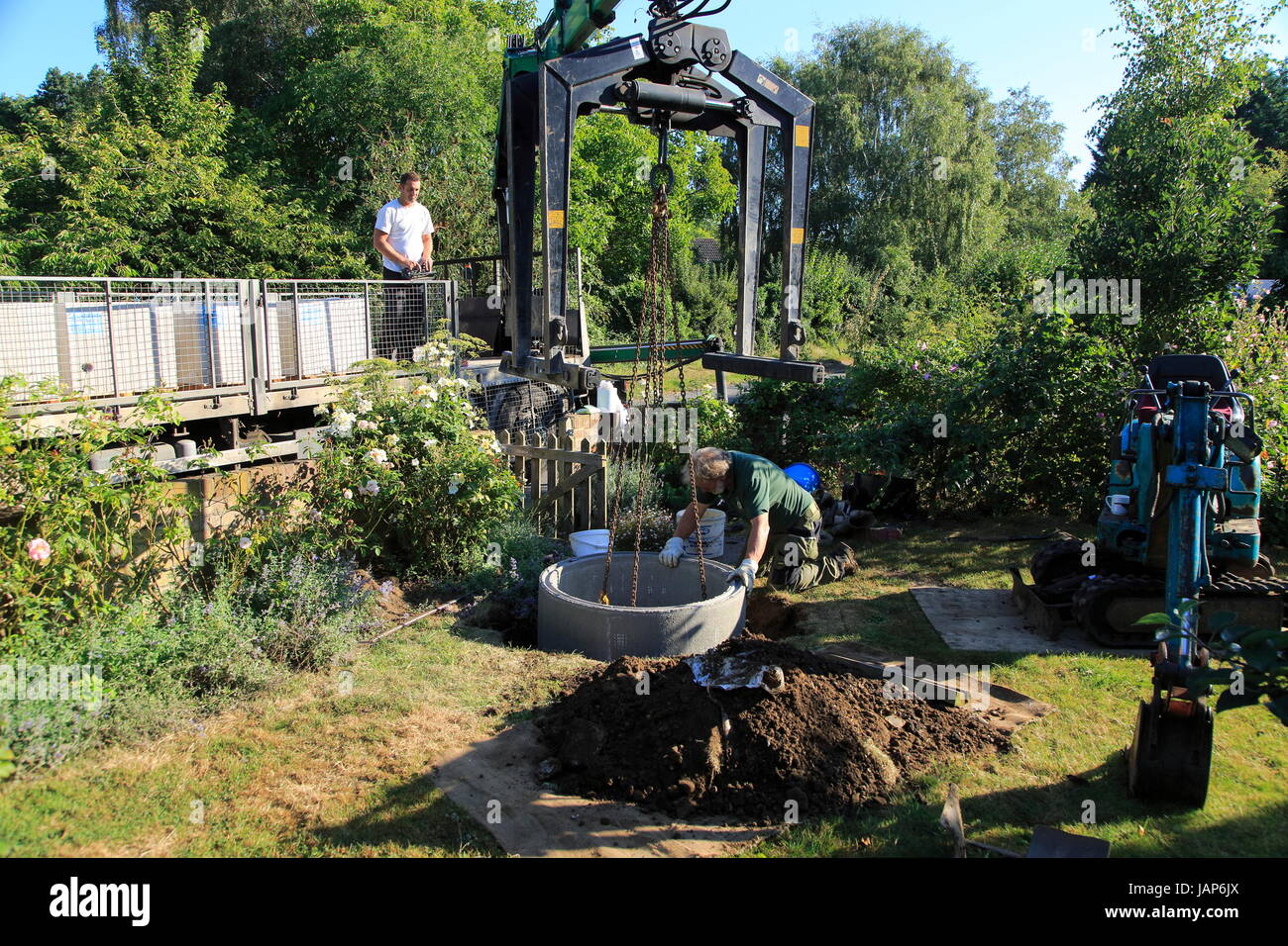 Delivery and installation of concrete ring for domestic septic tank ...