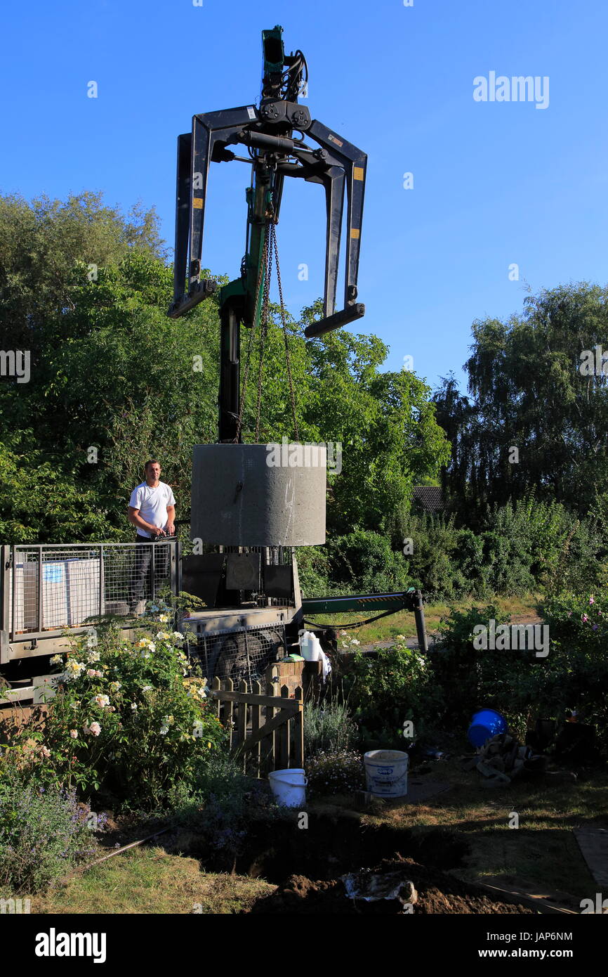 Delivery and installation of concrete ring for domestic septic tank ...