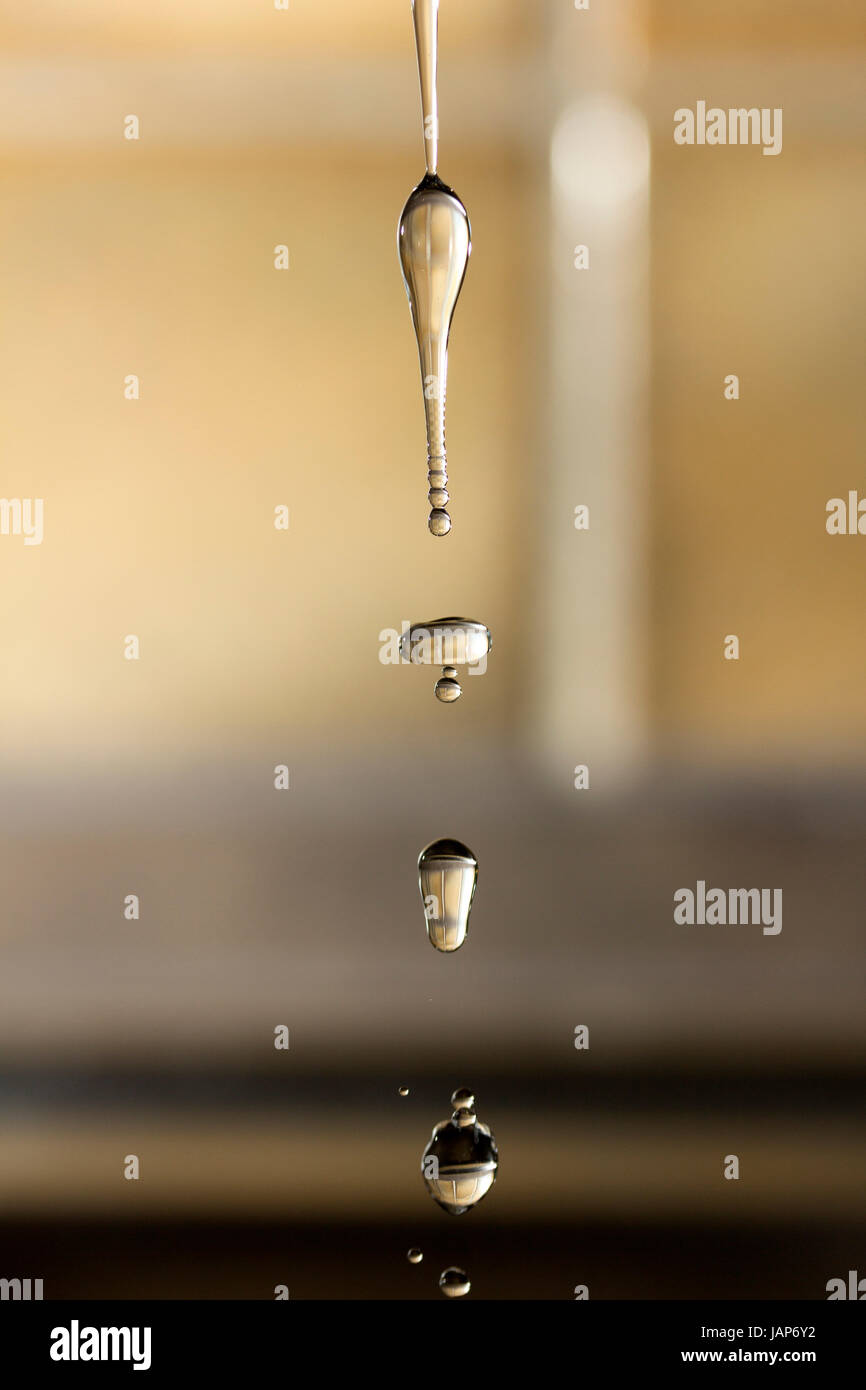 The fluid motion of water splashing as it is poured Stock Photo - Alamy