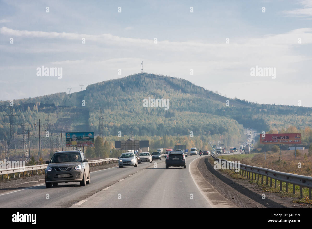 Perm, Russia - September 24.2016: Mountain in the distance and the road ...