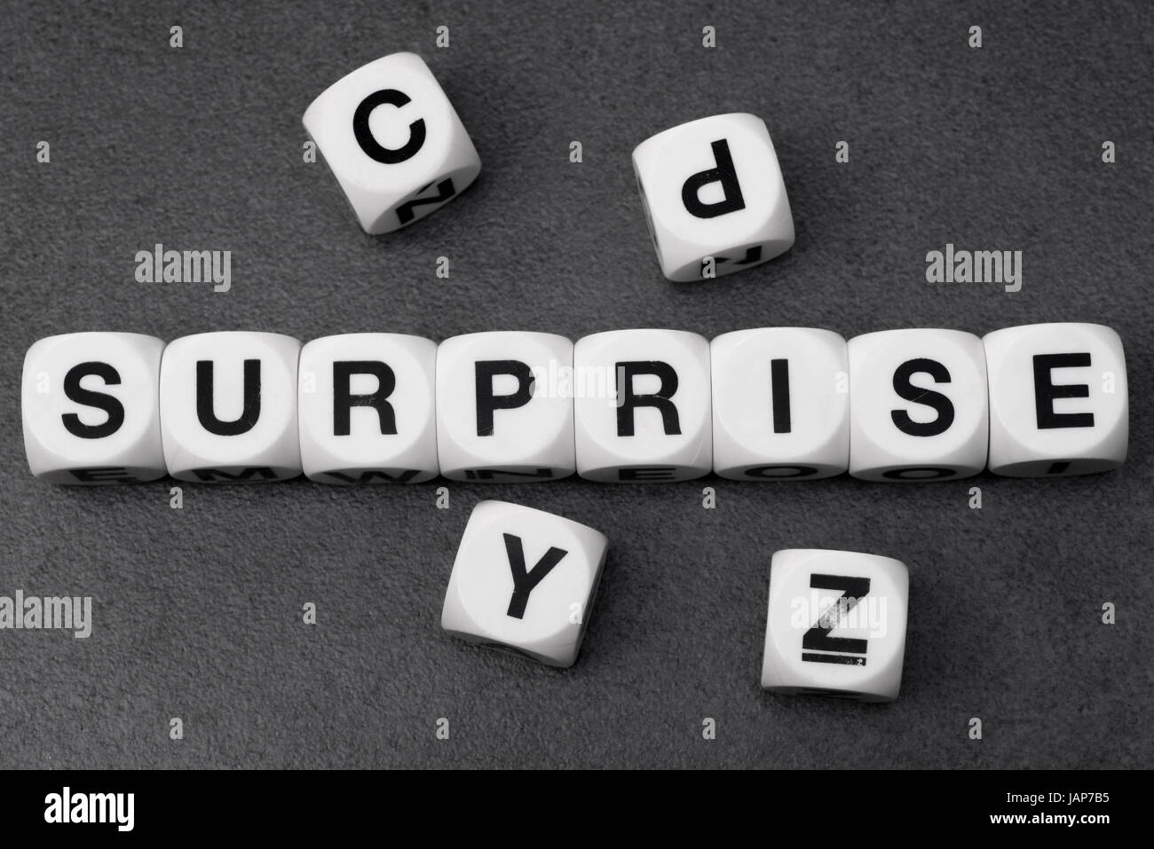 word surprise on white toy cubes Stock Photo - Alamy