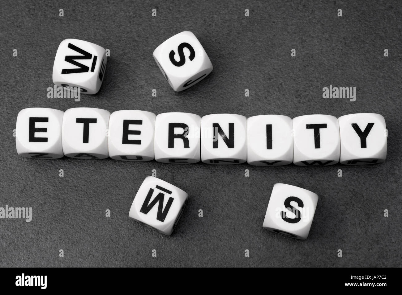 word eternity on white toy cubes Stock Photo - Alamy