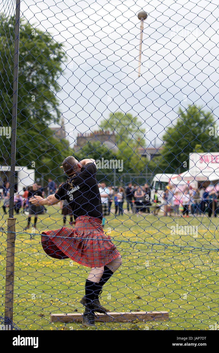 Cornhill, Scotland - 03 Jun 2017: A competitor in the Hammer Throw at ...