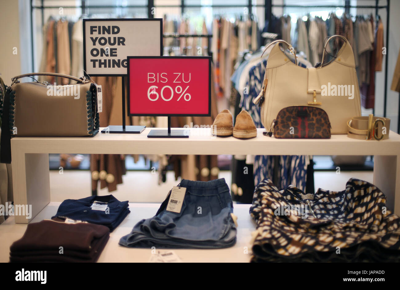 A sign saying 'Find your one thing' is pictured in the first German ...