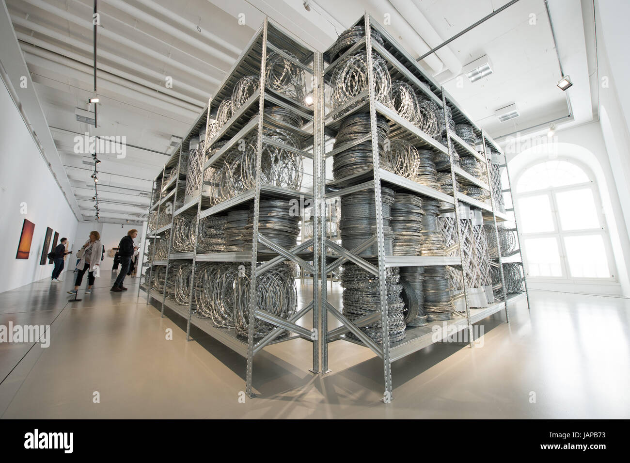 A visitor looks at K. Geers' sculpture 'Acropolis Redux' (2004) on ...