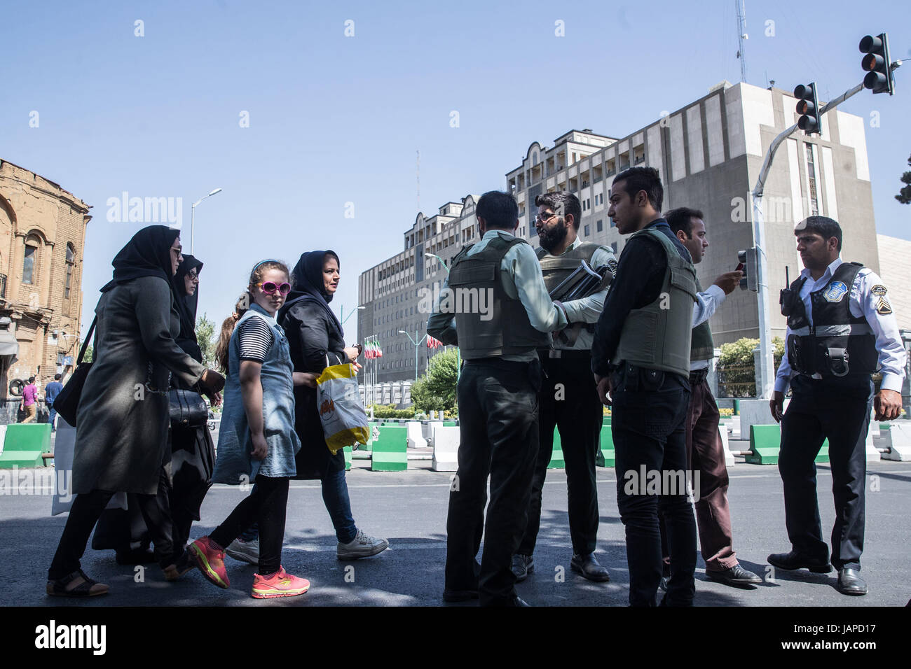 Tehran, Iran. 7th June, 2017. Iranian police officers conduct an ...