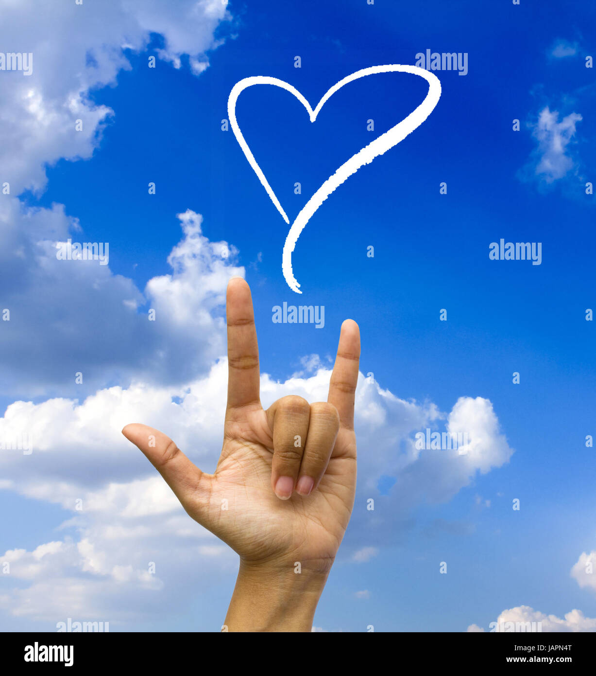 Gesturing hand on blue sky Stock Photo - Alamy