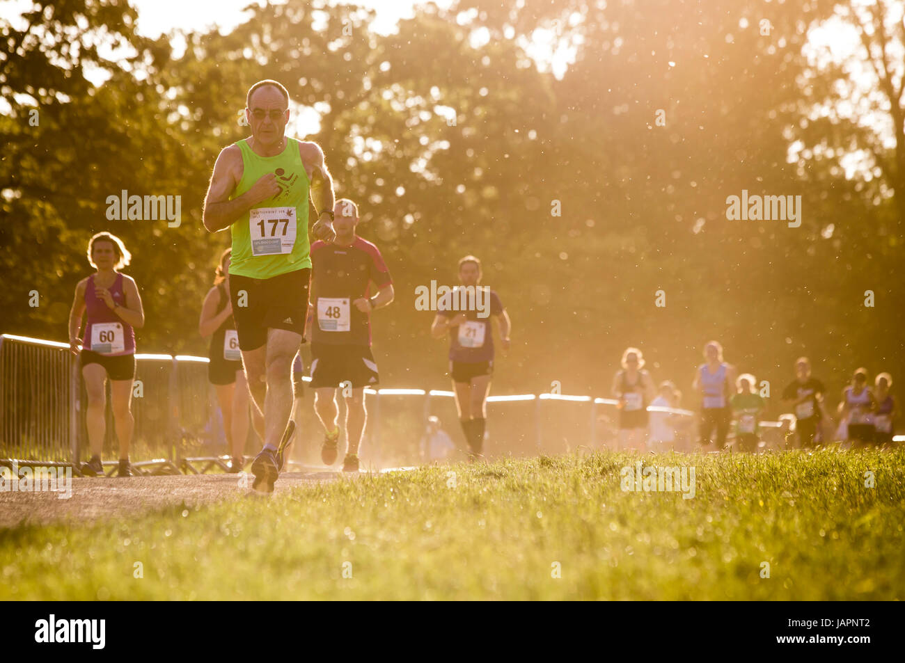 Runners from behind hi-res stock photography and images - Alamy