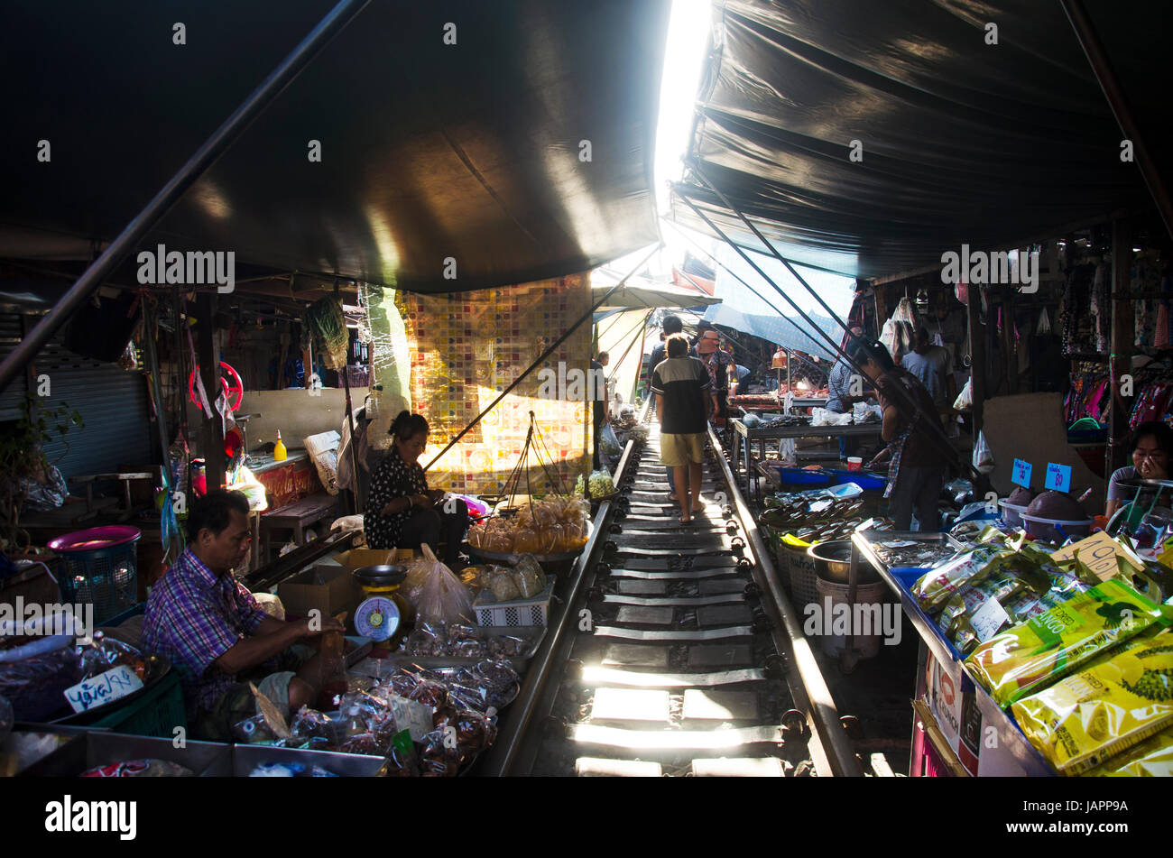 People walking visit and shopping in Mae klong Railway Market or Talat ...