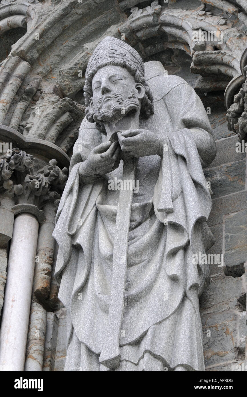Detail of the West Front of Nidaros Cathedral: a statue of Saint Denis ...