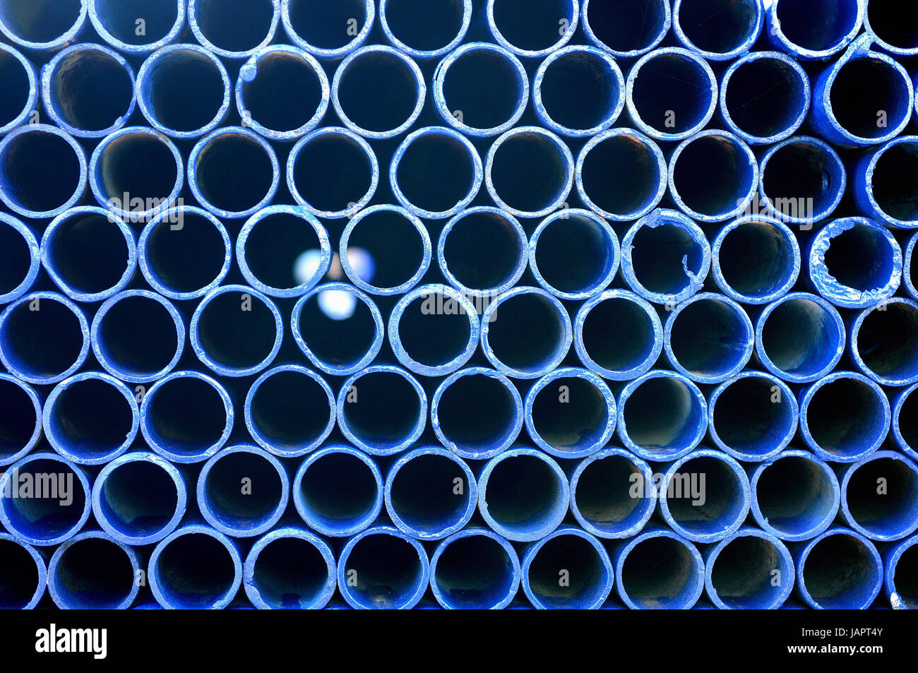 blue pipeline scaffolding pieces Stock Photo - Alamy