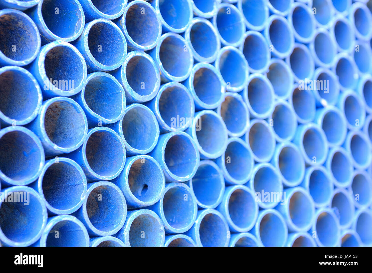 blue pipeline scaffolding pieces Stock Photo - Alamy