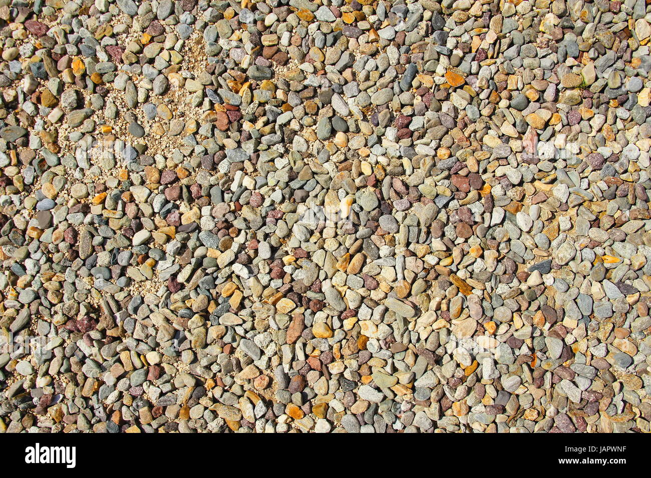 bunte Kieselsteine Struktur Stock Photo - Alamy