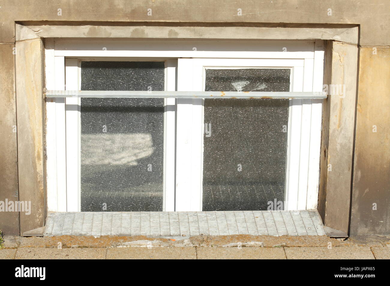 old cellar window with grid Stock Photo - Alamy