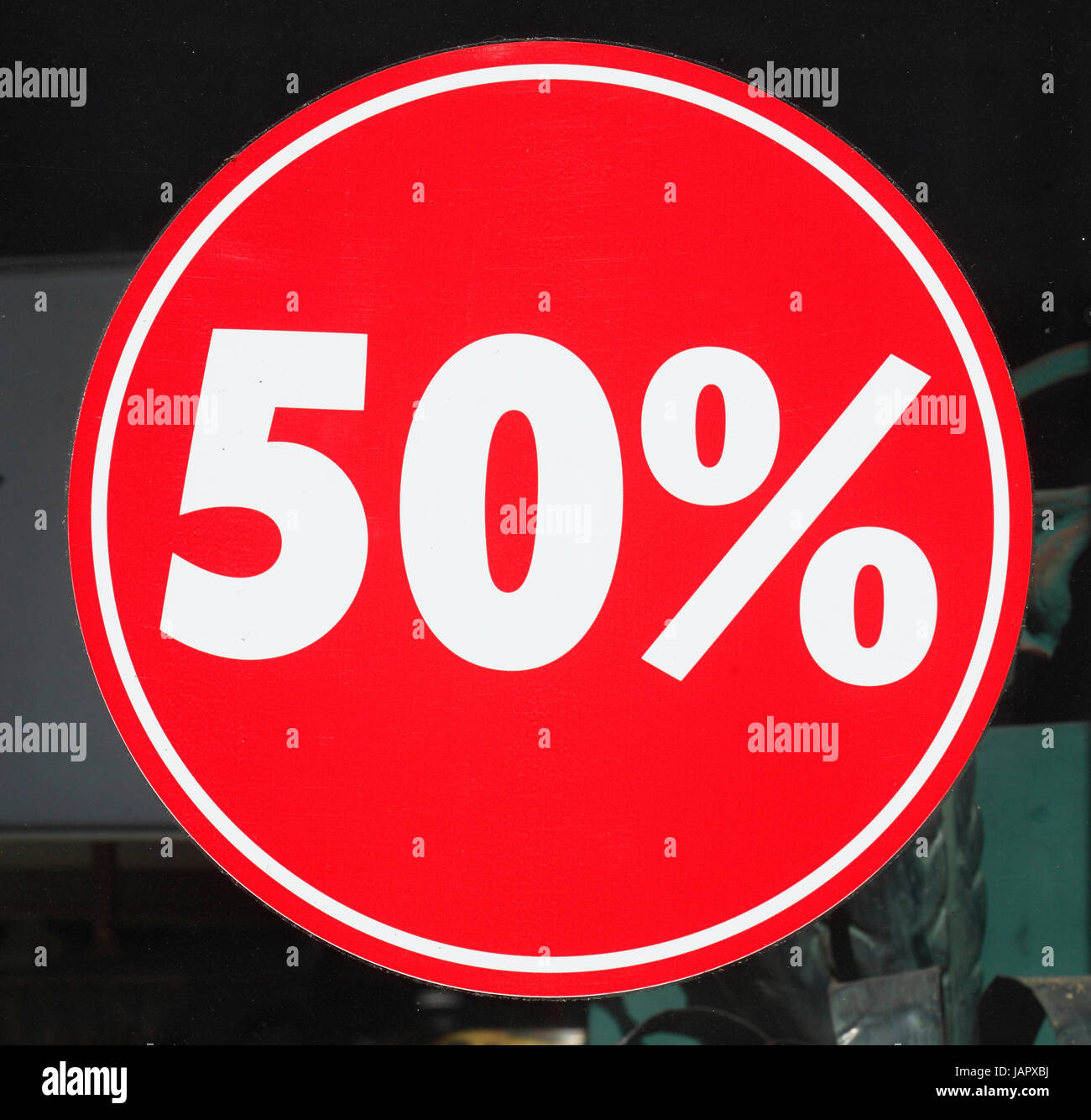 Red Sale Sign fifty percent price reduction Stock Photo - Alamy