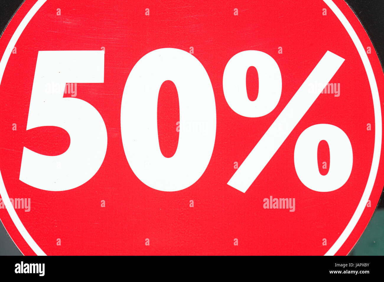 Red Sale Sign fifty percent price reduction Stock Photo - Alamy