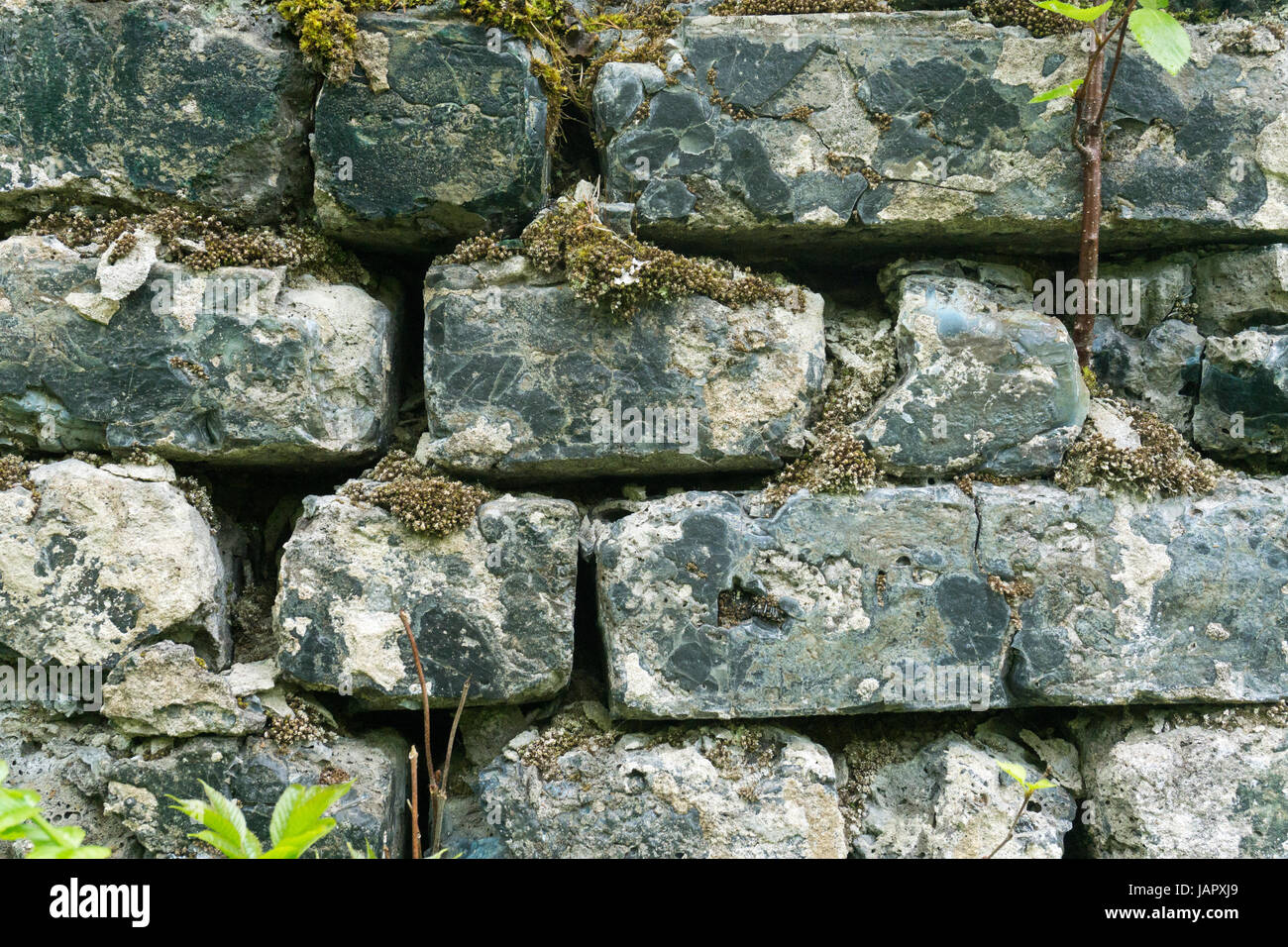 Wall built from bricks made of slag from the ironmaking process ...