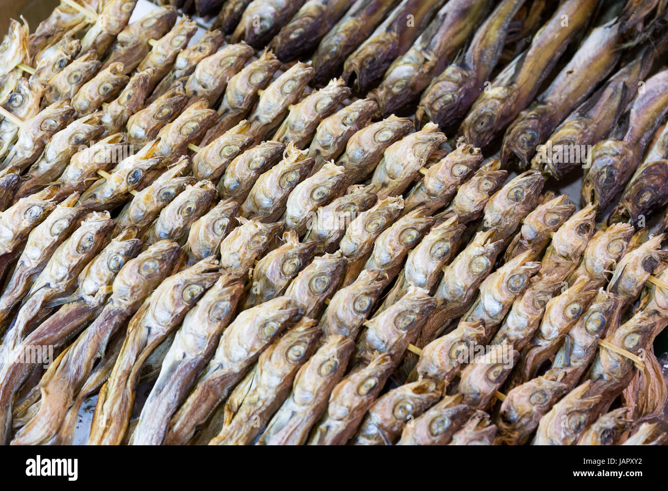 Dry salty fish Stock Photo - Alamy