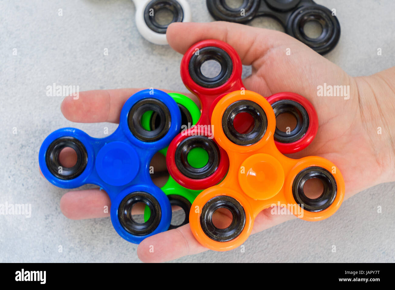fidget spinner, popular relaxing toy, generic design Stock Photo - Alamy