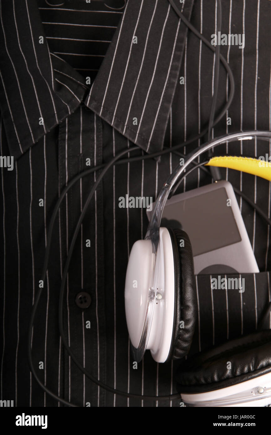 A corporate MP3 device in a shirts pocket Stock Photo - Alamy