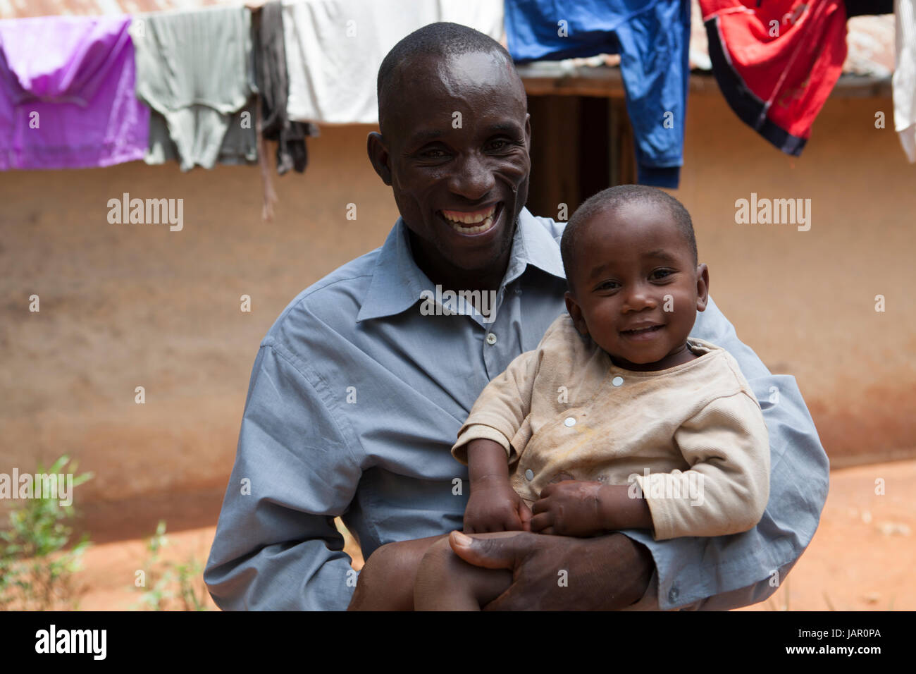 Father carrying son africa hi-res stock photography and images - Alamy