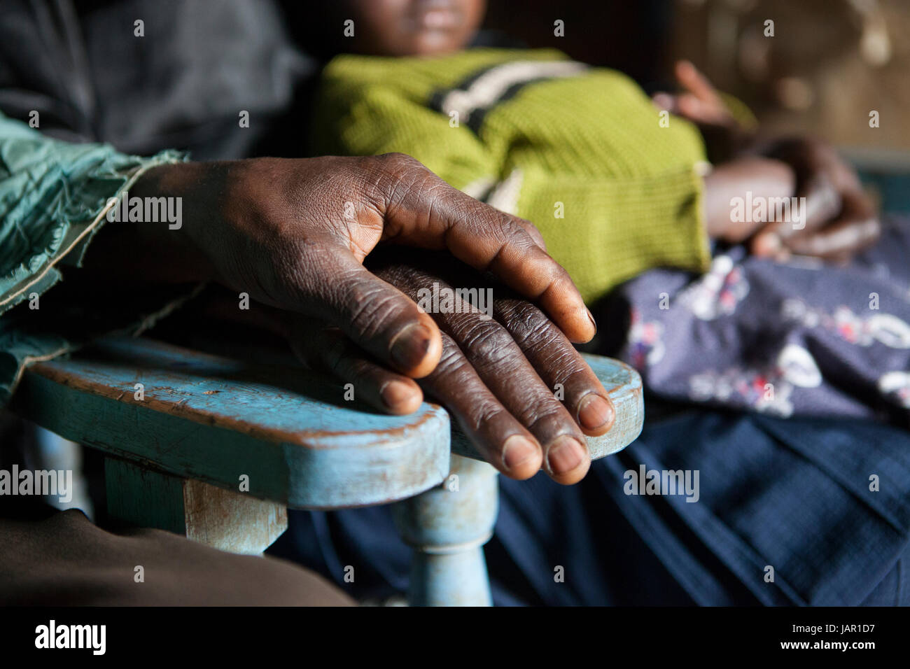 Two people holding hands, Kenya, Africa Stock Photo - Alamy