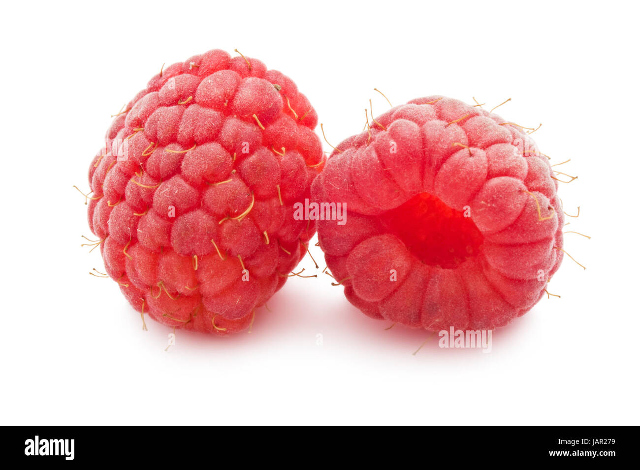 Ripe red raspberries isolated on white background Stock Photo - Alamy
