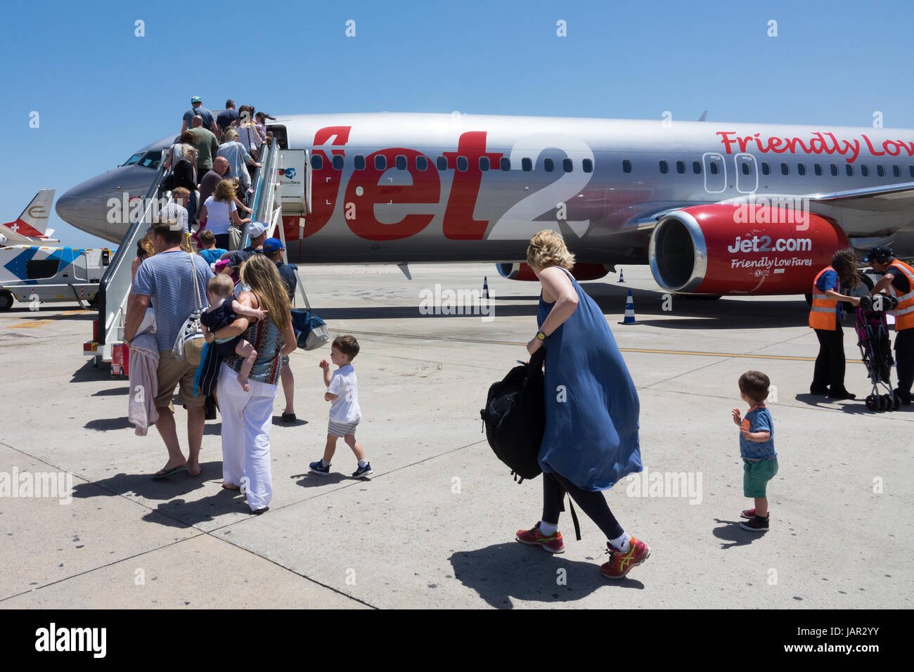 Passengers boarding a jet2.com aircraft at Ibiza airport Stock Photo ...
