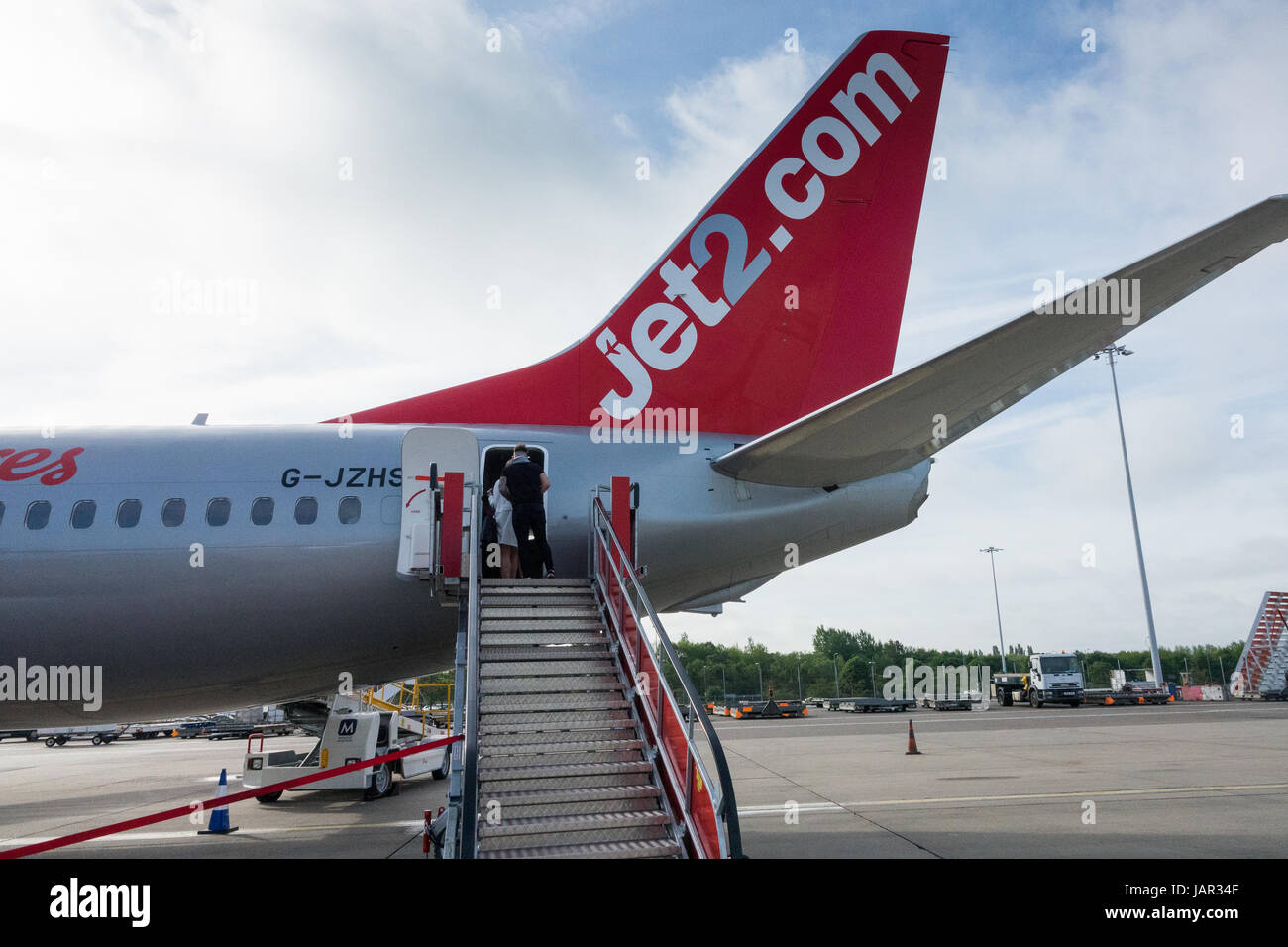 Passengers boarding a jet2.com aircraft at Ibiza airport Stock Photo ...