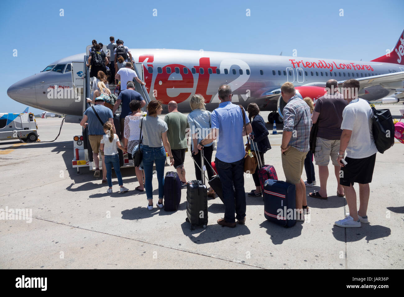 Passengers boarding a jet2.com aircraft at Ibiza airport Stock Photo ...
