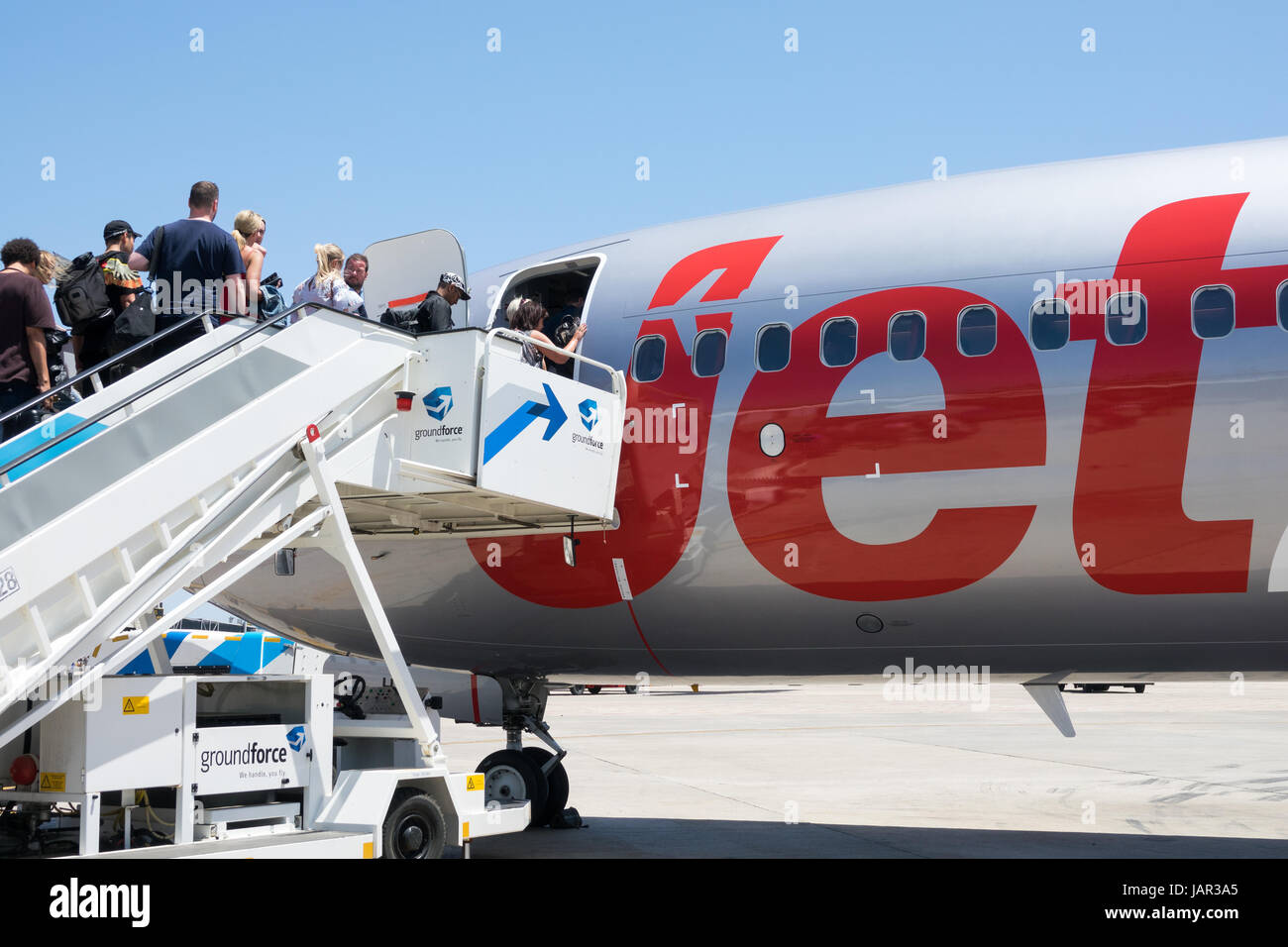 Passengers boarding a jet2.com aircraft at Ibiza airport Stock Photo ...