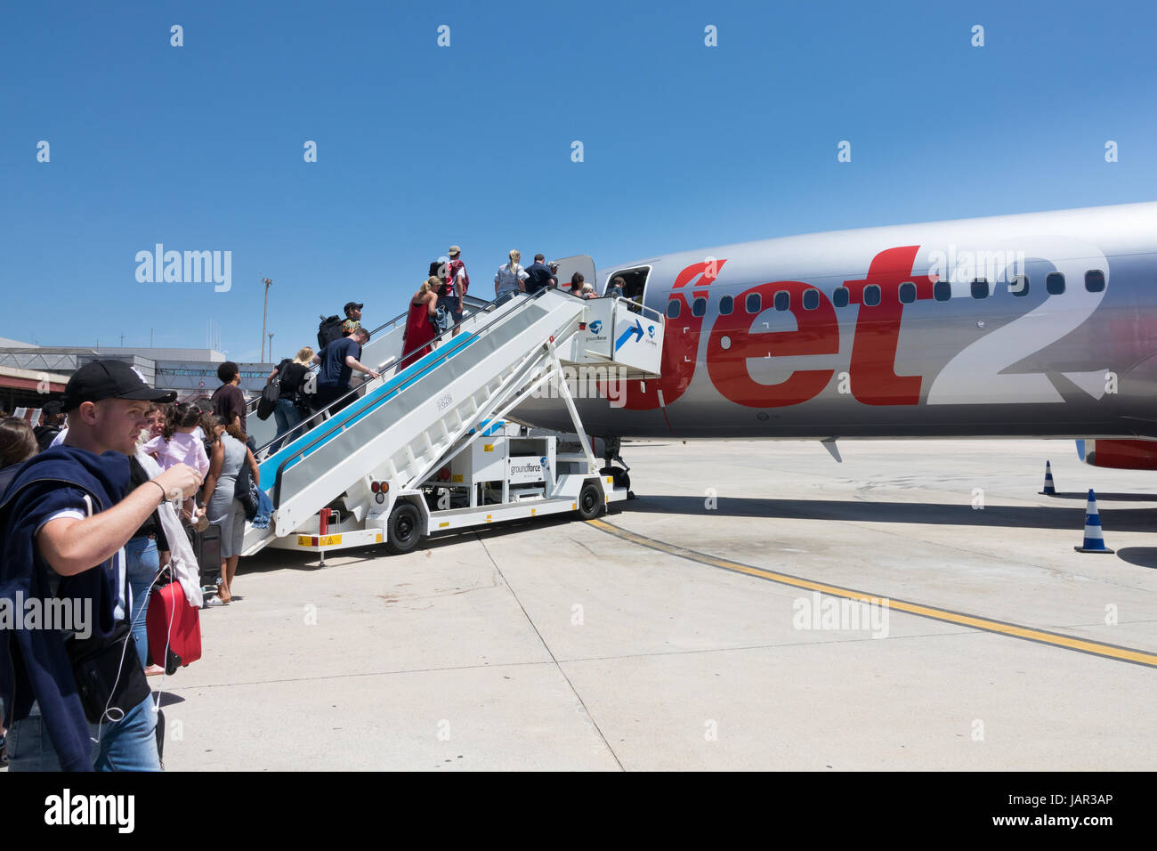 Passengers boarding a jet2.com aircraft at Ibiza airport Stock Photo ...