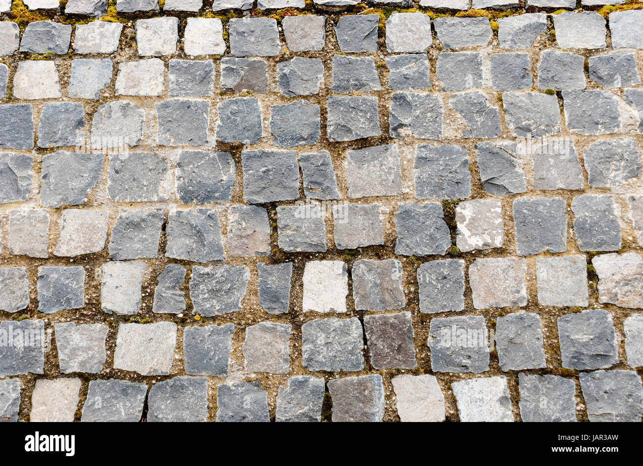 Elegant stone wall from small square parts Stock Photo - Alamy