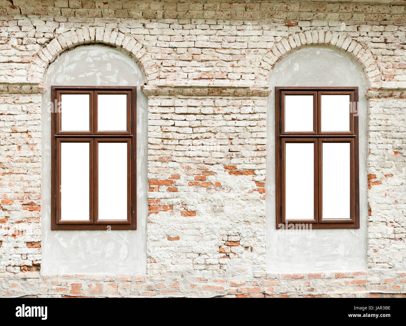 old brick house wall with white windows Stock Photo - Alamy