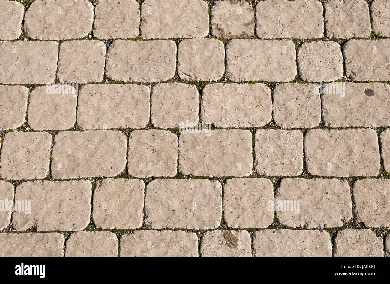 Elegant stone wall from small square parts Stock Photo - Alamy