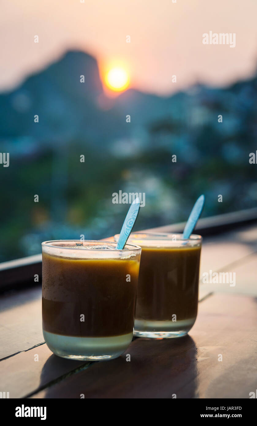 Coffee for two with romantic sunset view Stock Photo - Alamy
