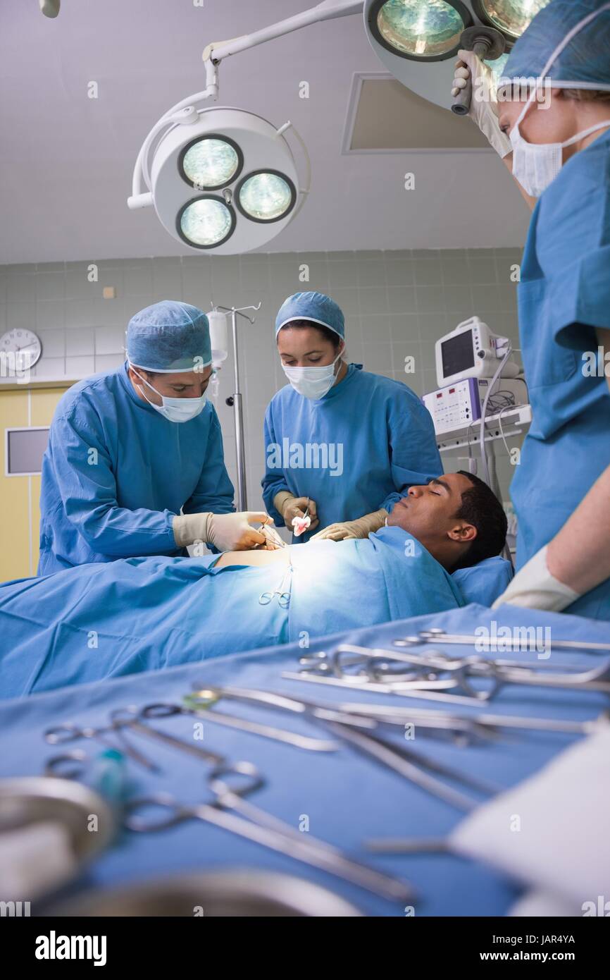 Operation a hi-res stock photography and images - Alamy