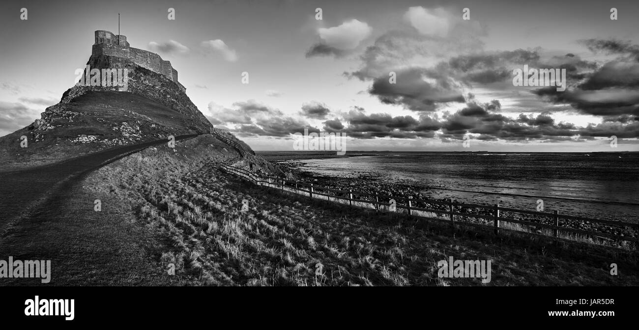 Black and white image of Lindisfarne Castle at low tide Stock Photo - Alamy
