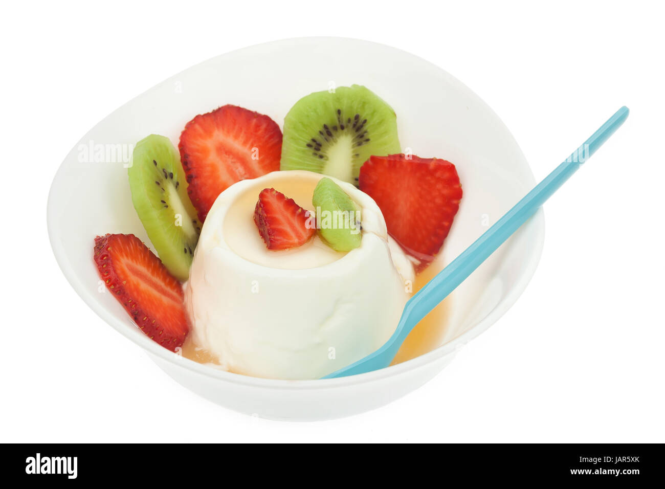 Sweet yogurt with fruits and honey in bowl isolated on white background ...