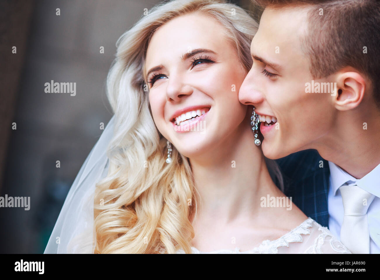 Wedding romantic couple is hugging each other. Beauty bride with groom ...