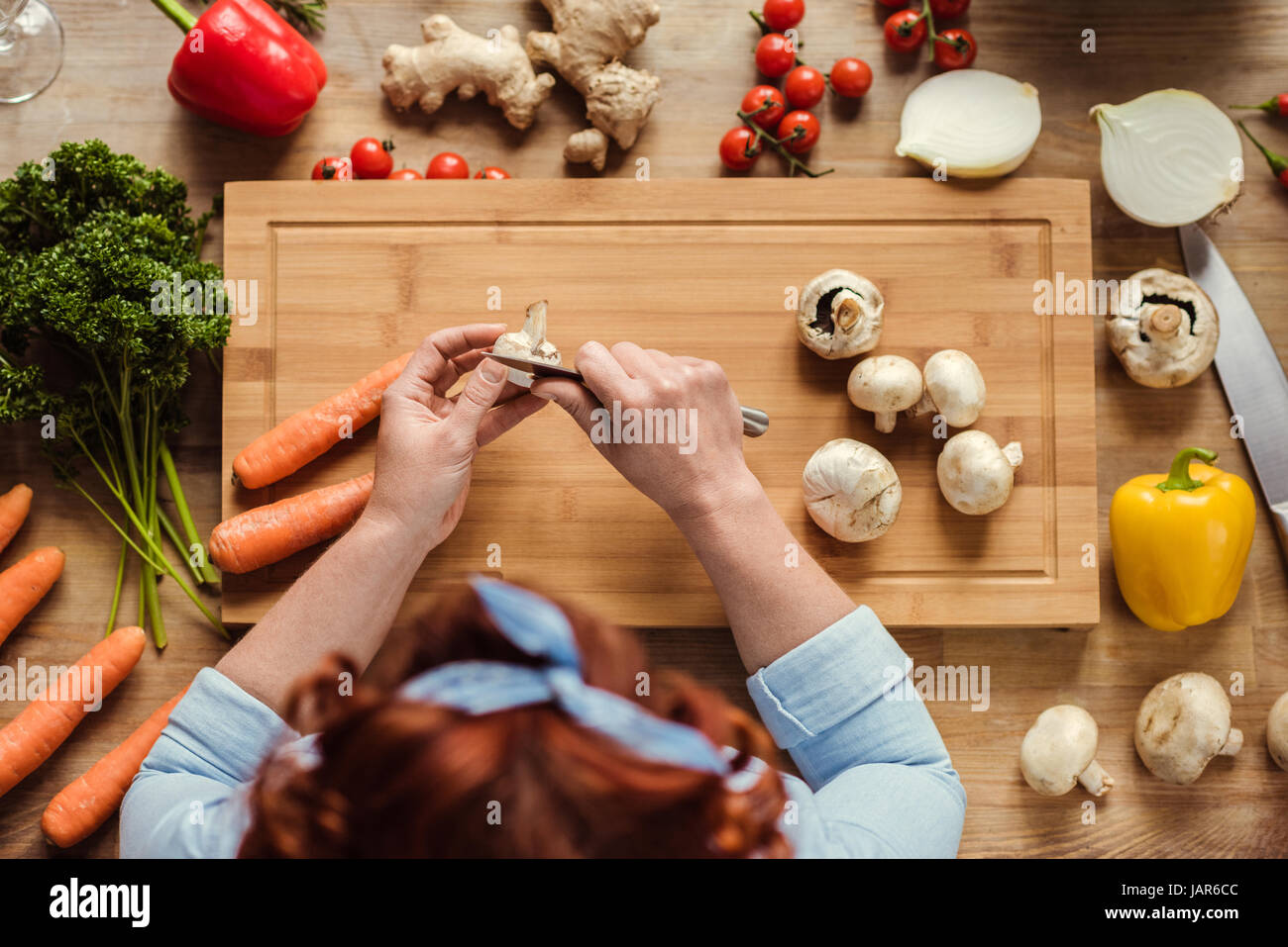 Woman preparing salad Stock Photo - Alamy