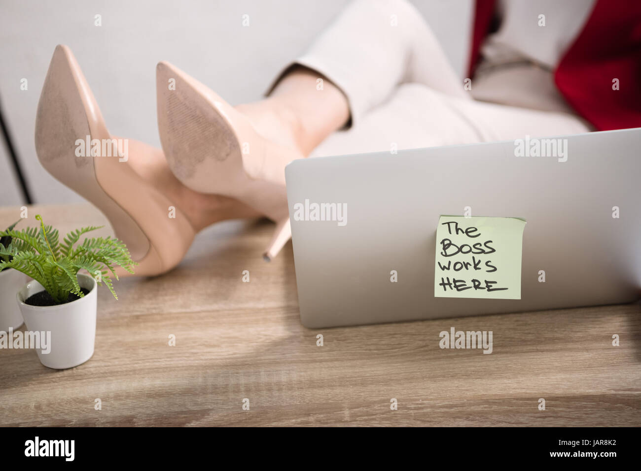 female legs near laptop Stock Photo - Alamy