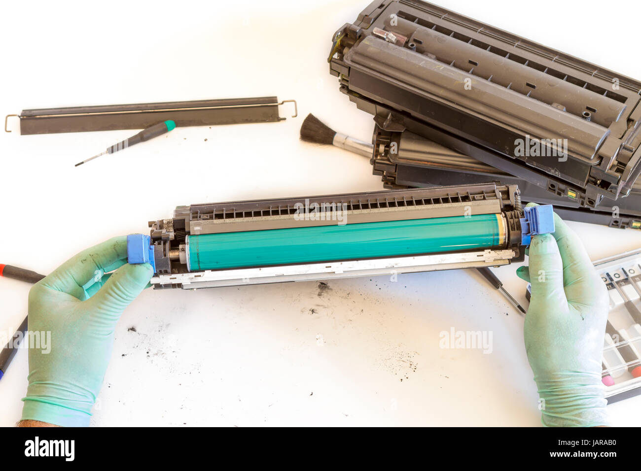 worker Laser printer on a workbench. Printer workshop Stock Photo - Alamy
