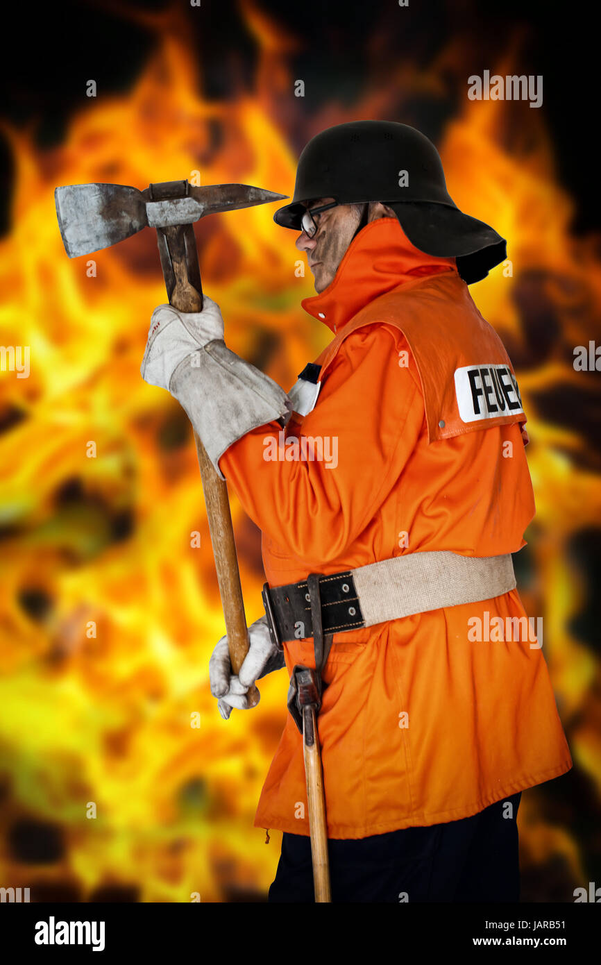 fireman in action Stock Photo - Alamy