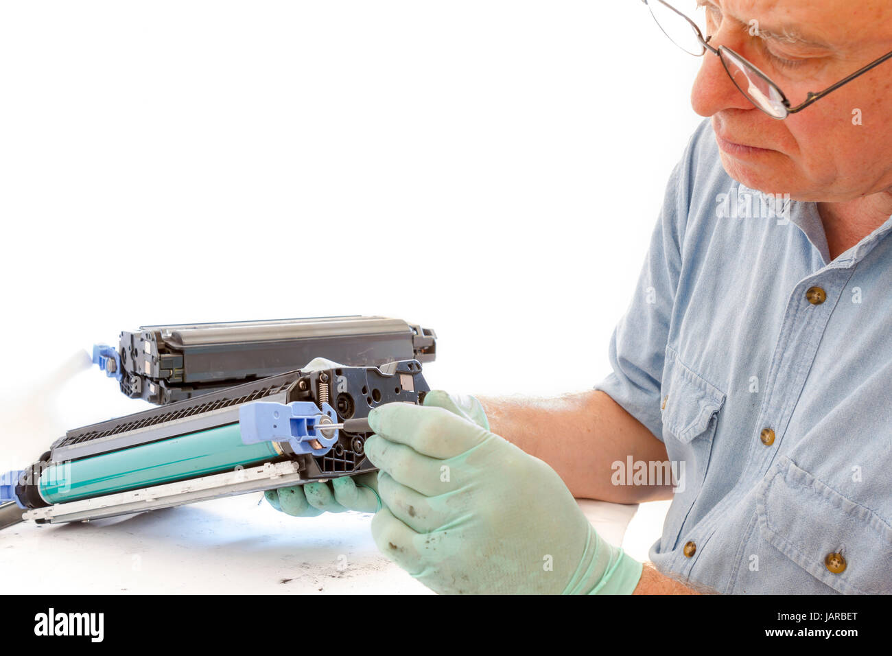 worker Laser printer on a workbench. Printer workshop Stock Photo - Alamy
