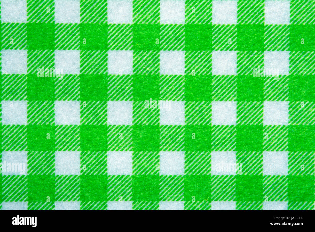 material into a green grid and textile background Stock Photo - Alamy