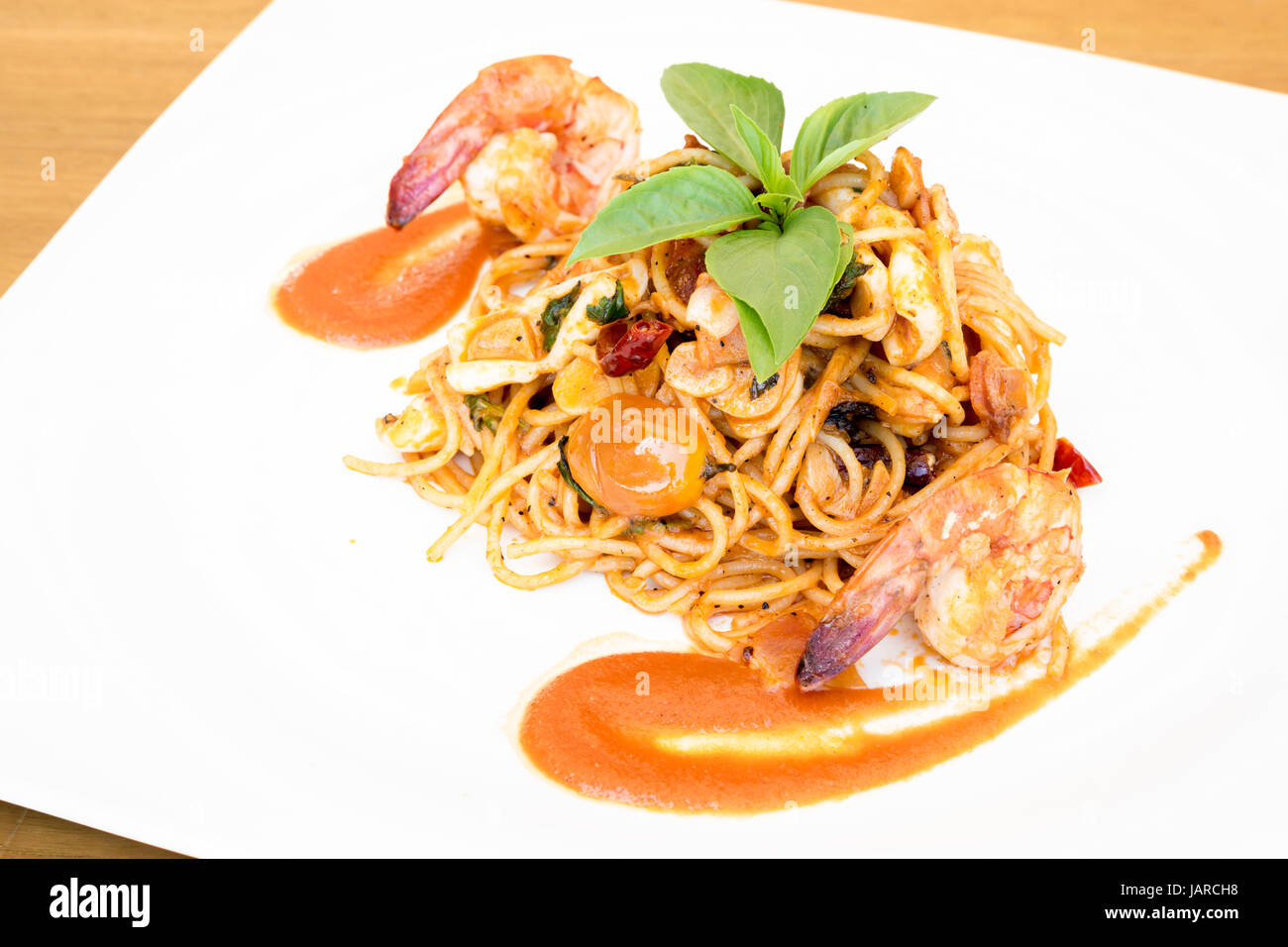 Seafood Spaghetti with tiger prawn meal cuisine Stock Photo - Alamy