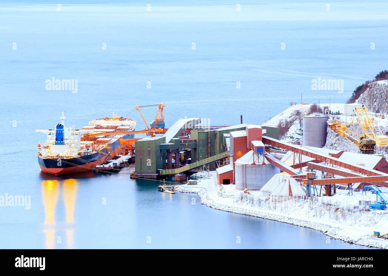 Industrial Container Cargo freight ship with working crane bridge in ...